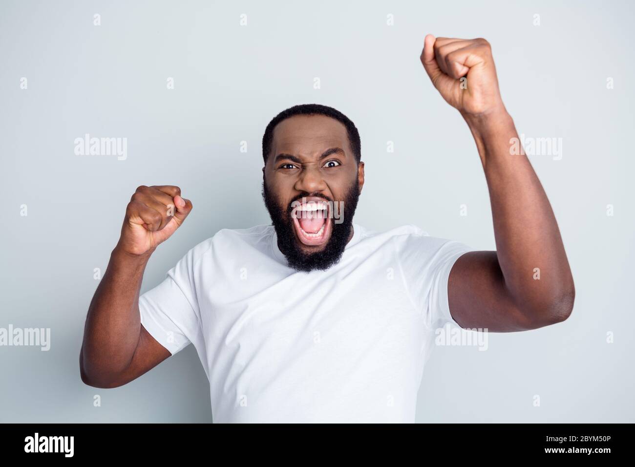 Photo of rage mad outraged dark skin african guy protester community ...