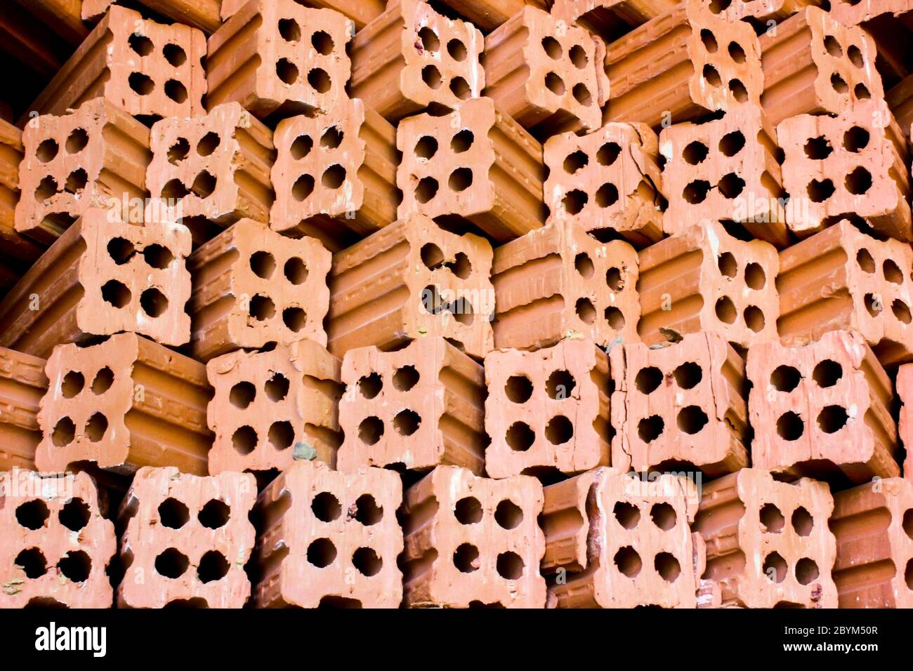 brick kiln. collection set of red bricks stack in oven factory before ...