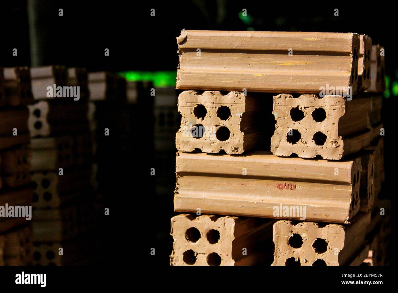 brick kiln. collection set of red bricks stack in oven factory before ...