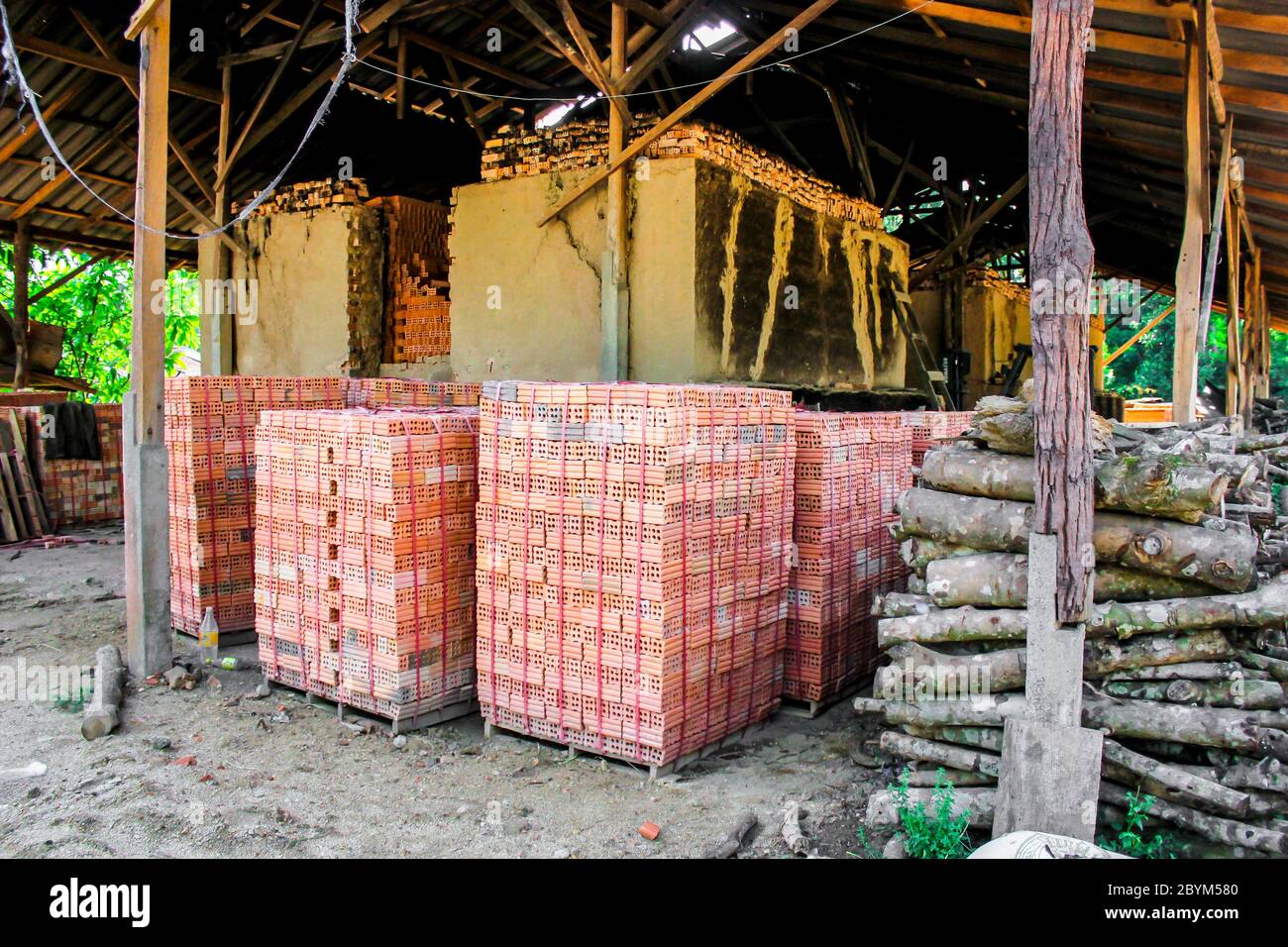 brick kiln. collection set of red bricks stack in oven factory before ...
