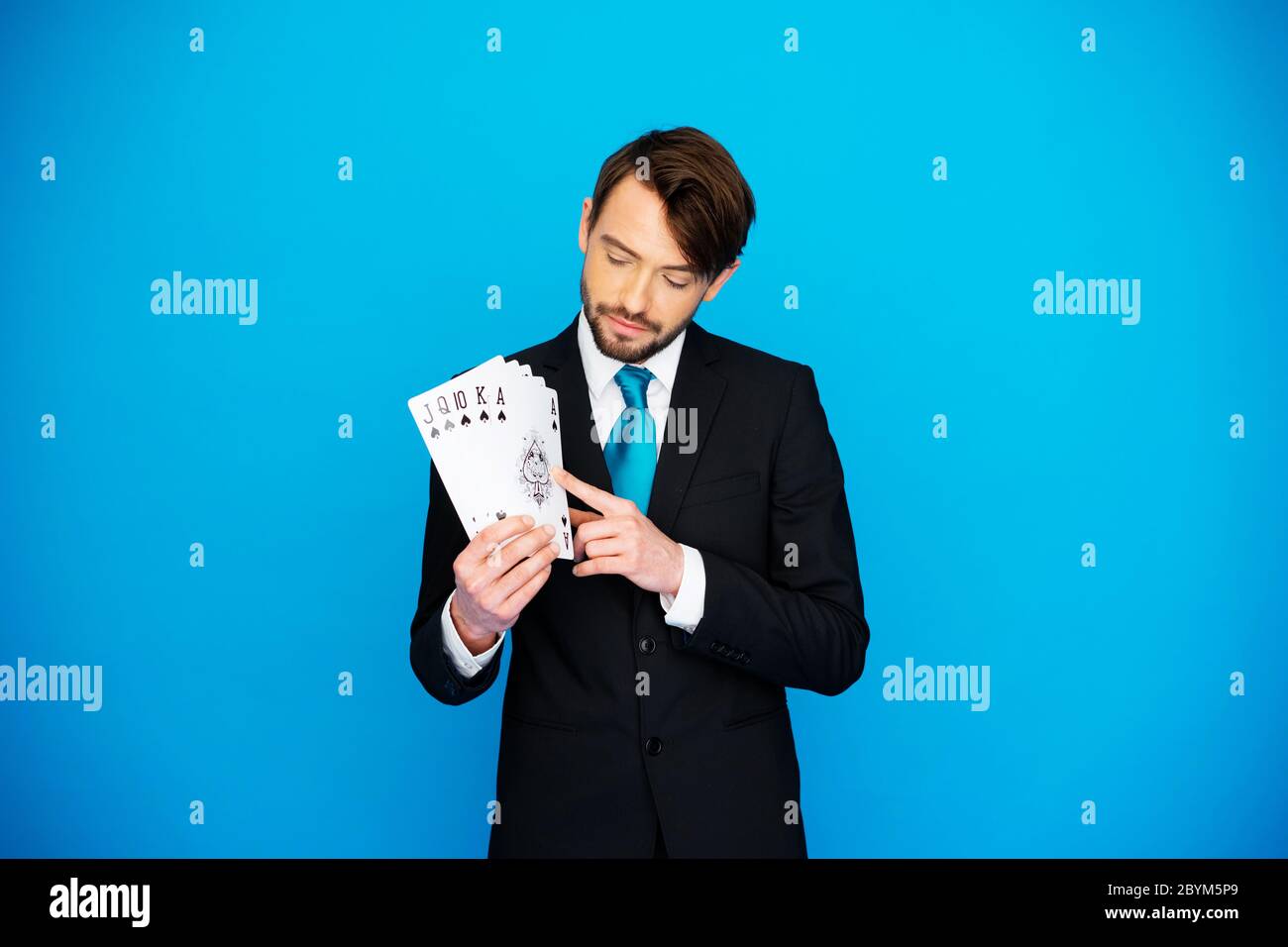 Man showing playing card hi-res stock photography and images - Alamy