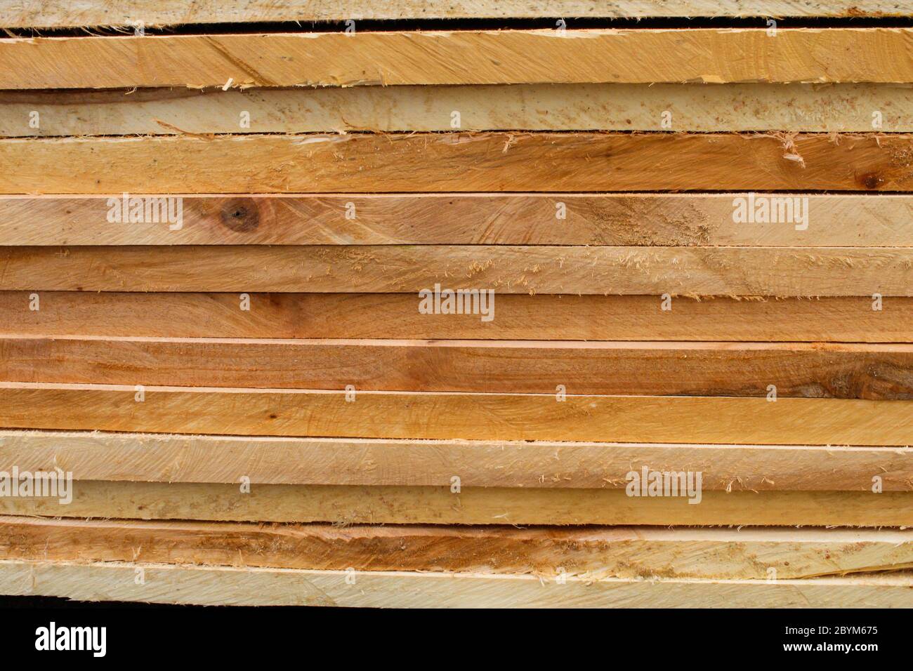 pile of sawed wood planks Stock Photo - Alamy