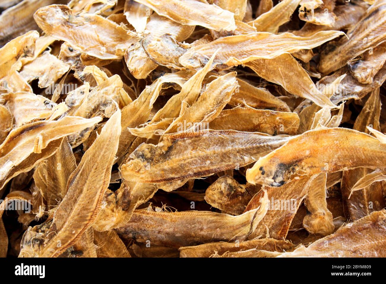 dried small fish in the thai market Stock Photo - Alamy