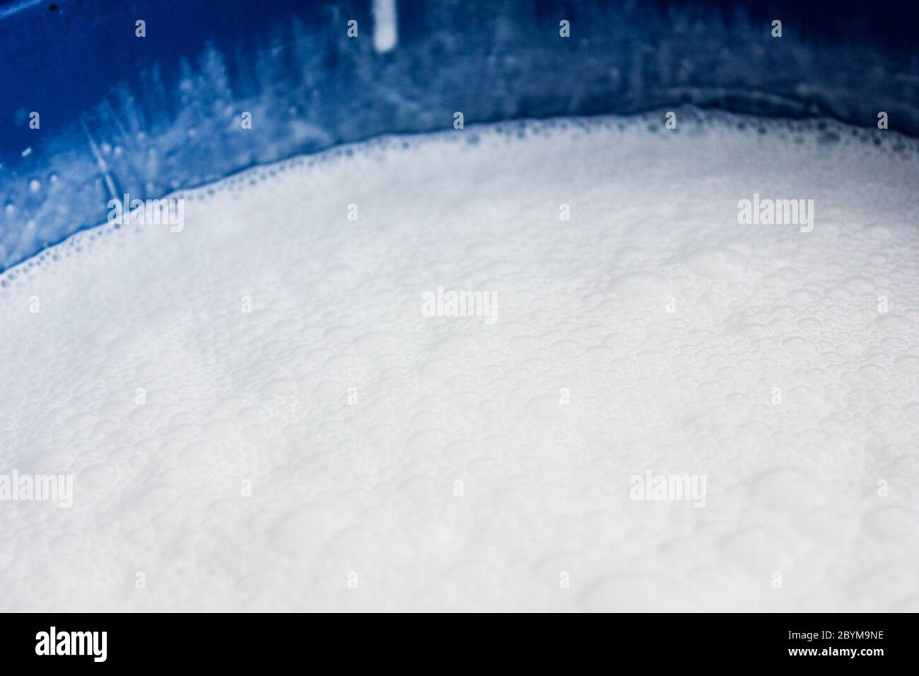 The white water rubber milk agriculture is on the tank Stock Photo - Alamy