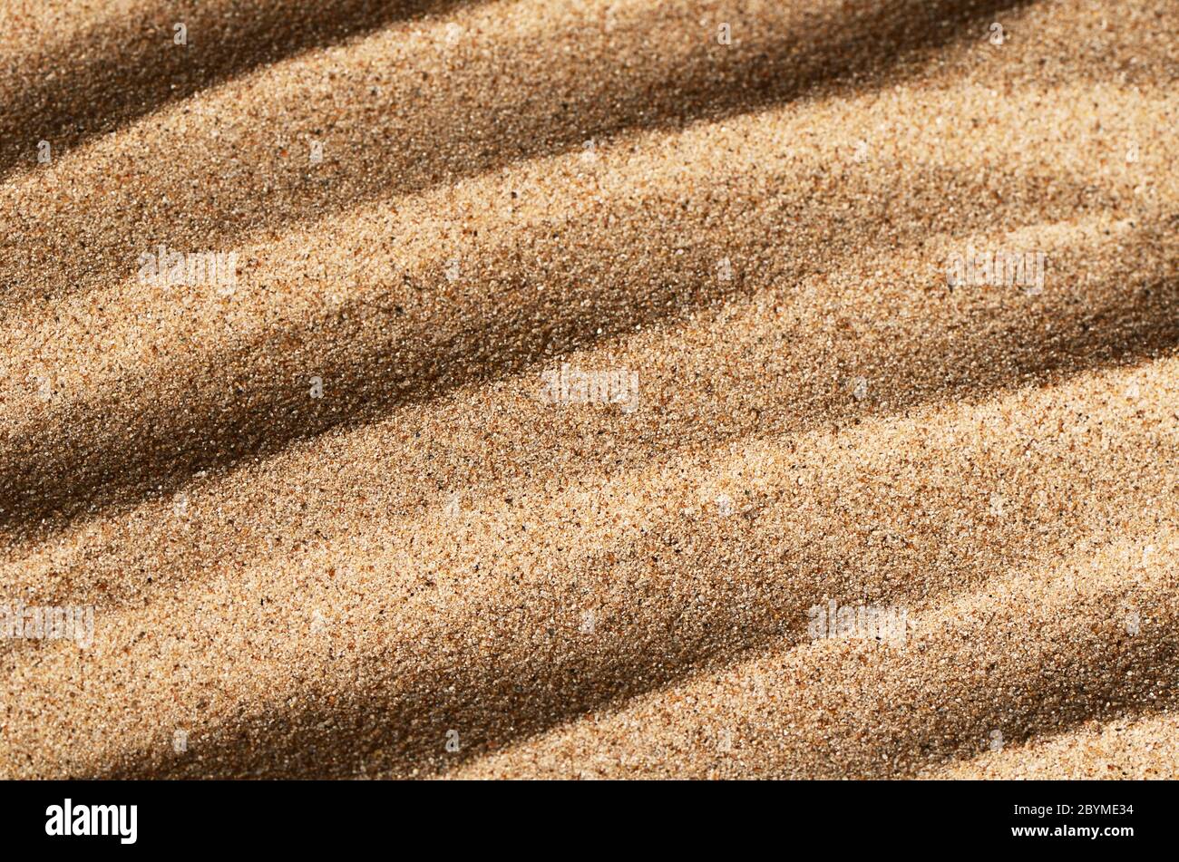 Sand texture as a background Stock Photo - Alamy