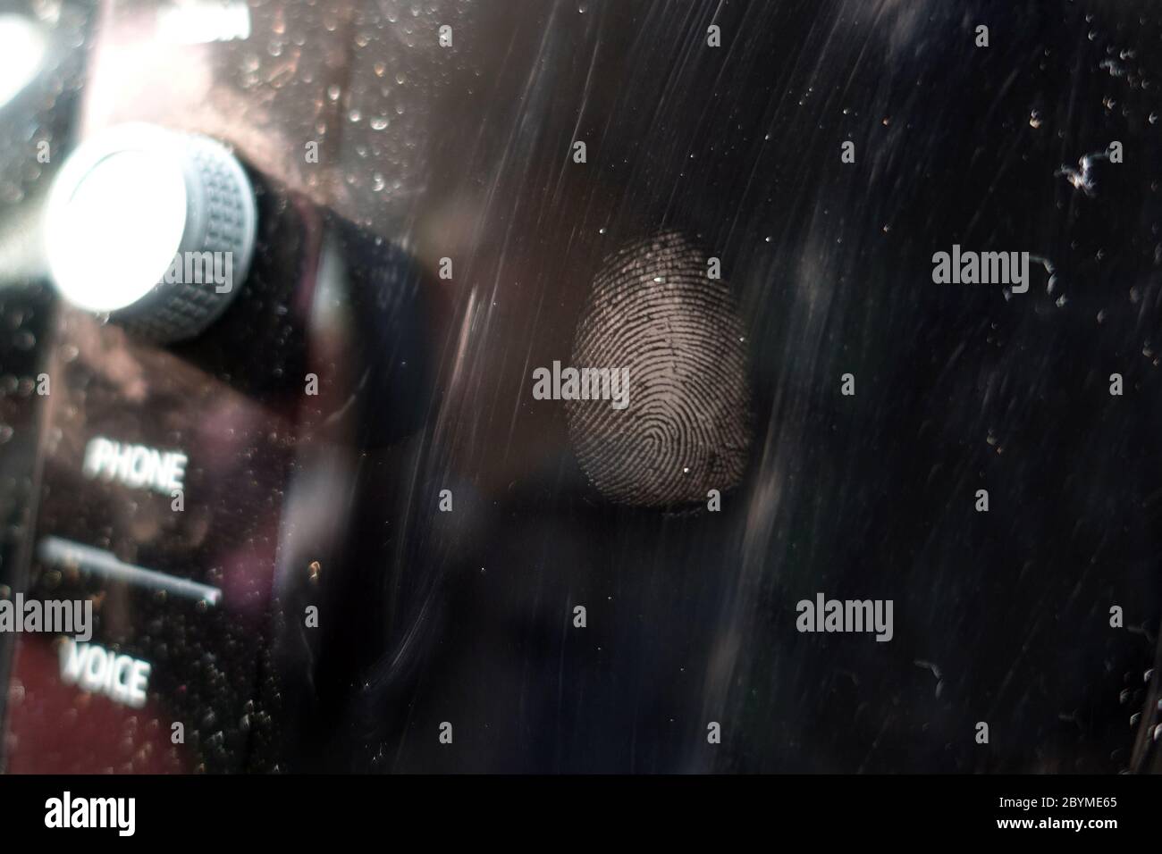 11.05.2019, Berlin, , Germany - Fingerprint on the side window of a car ...