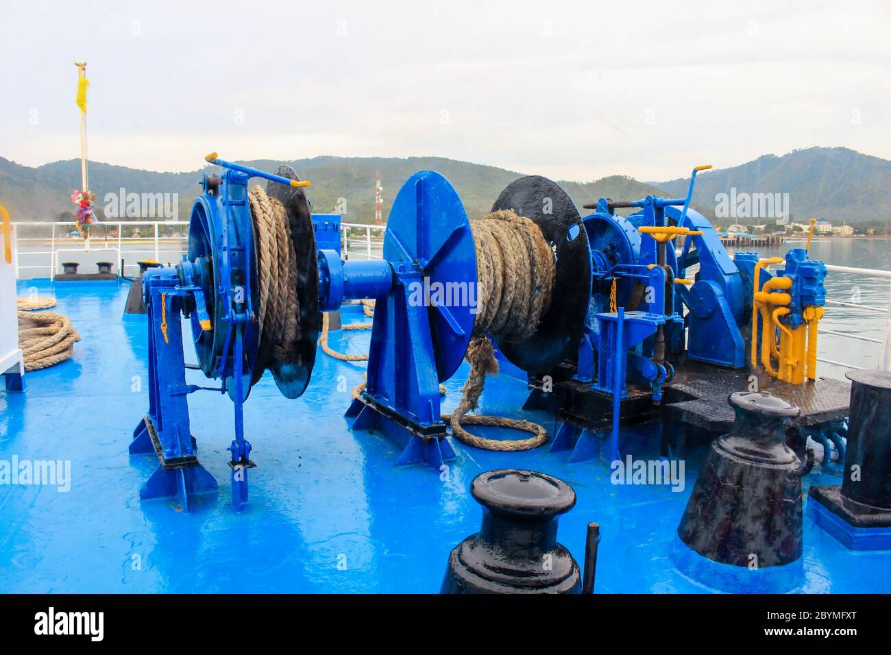 winch with rope anchor of ferry to samui Stock Photo - Alamy