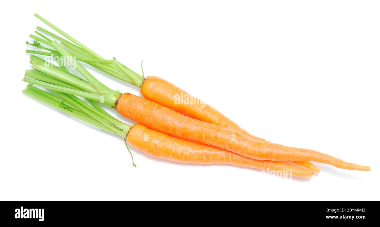 Ripe carrot roots isolated Cut Out Stock Images & Pictures - Alamy