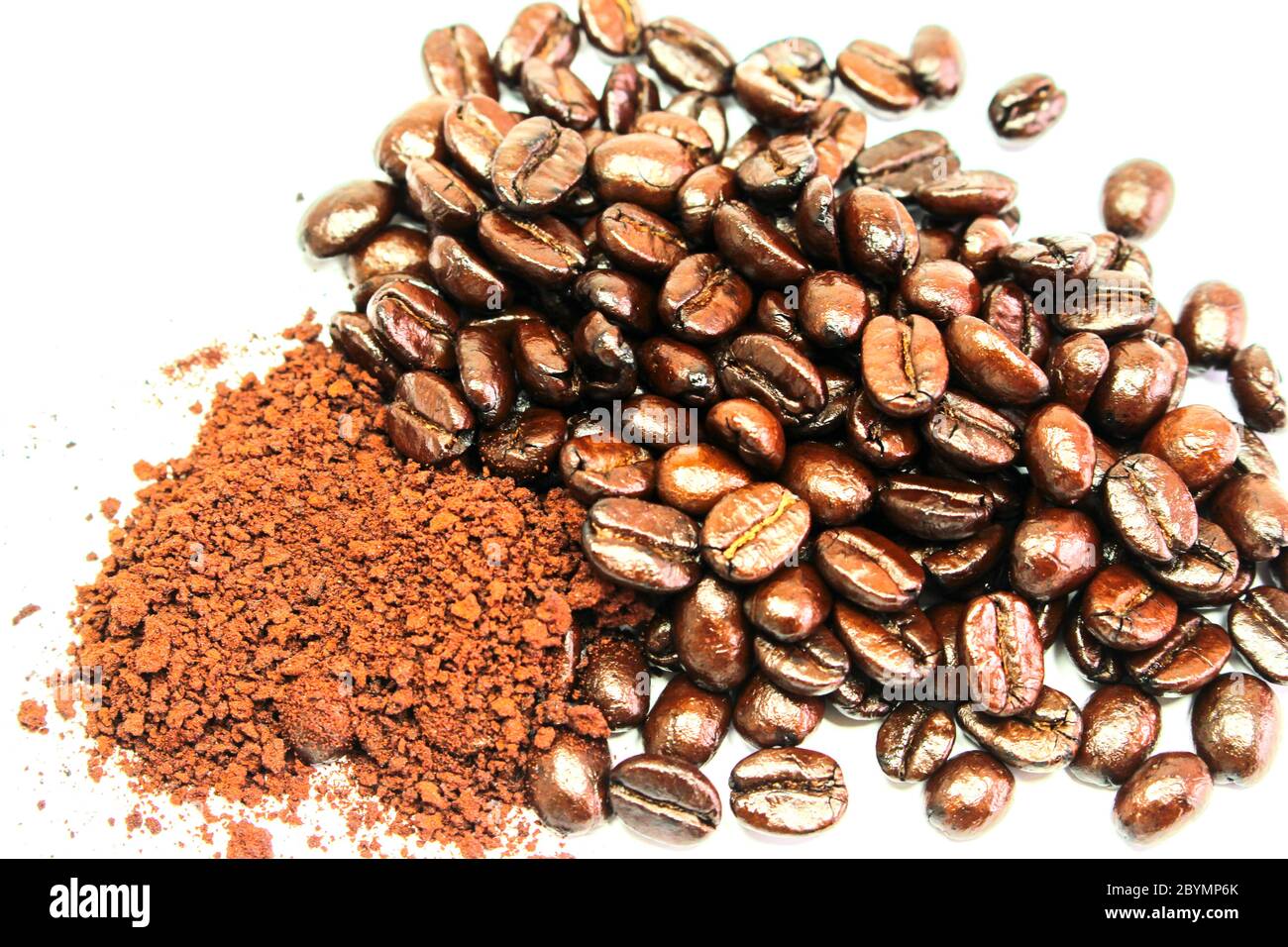 close-up shot coffee seeds isolated on white background Stock Photo - Alamy