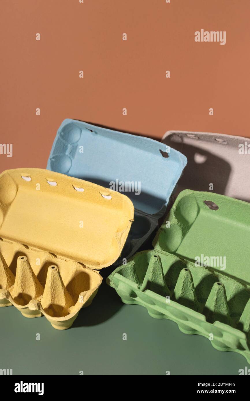 Colored trays from eggs. Garbage collection for recycling concept Stock ...