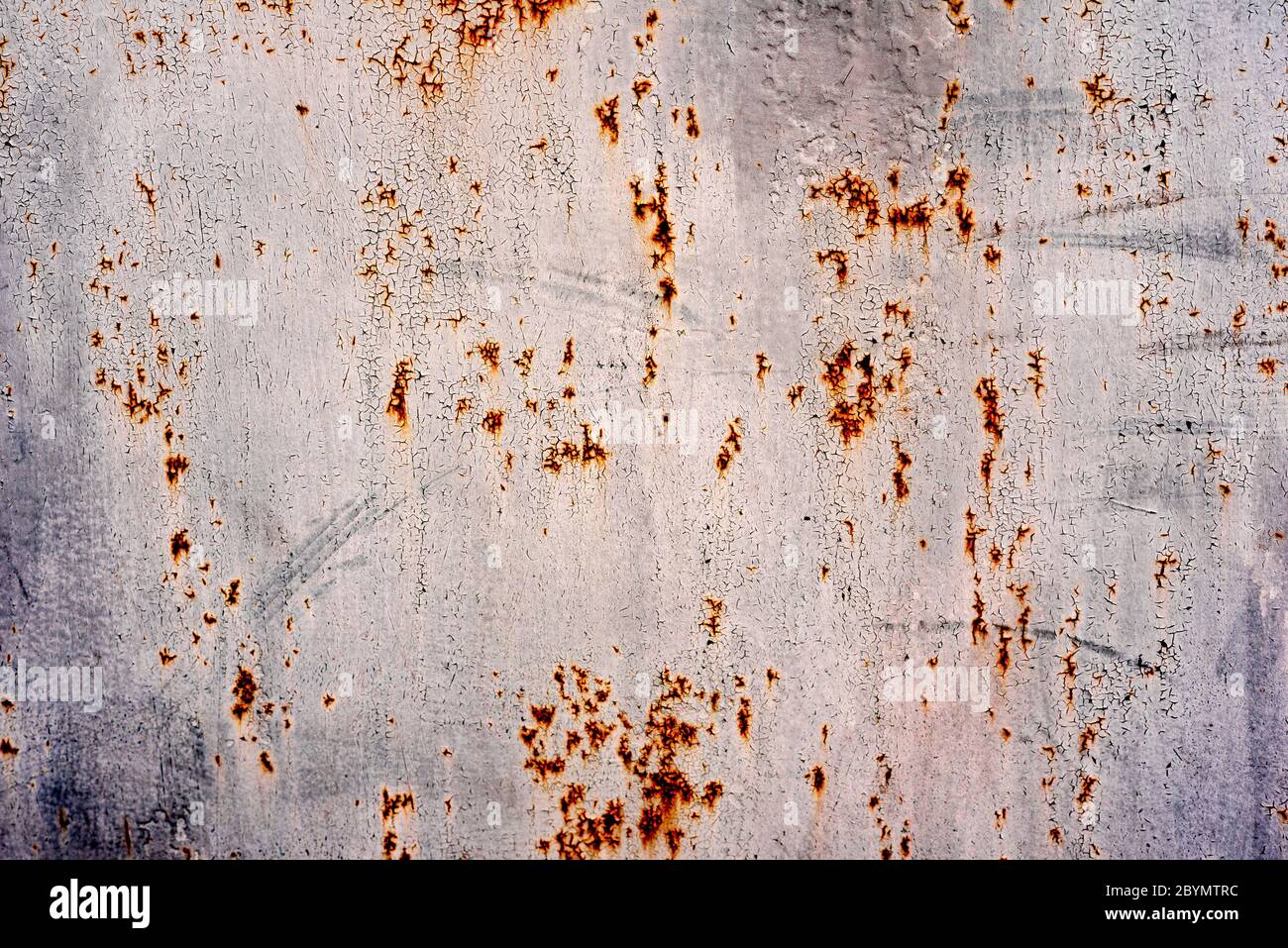 Texture of a metal wall with cracks and scratches which can be used as ...
