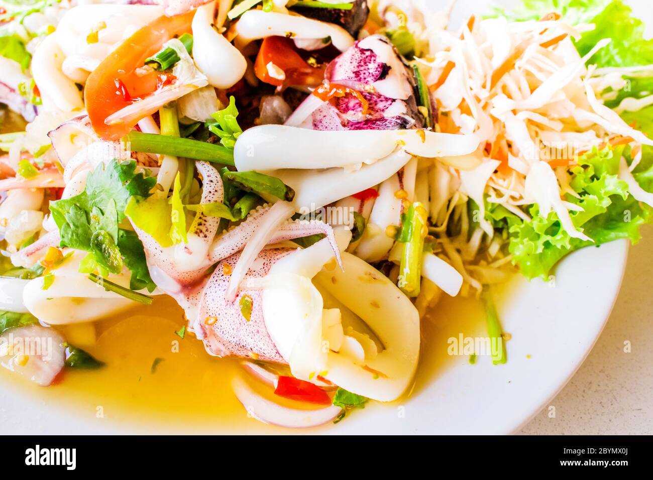 steam squid eggs salad with spicy lemon juice soup, samui thailand ...