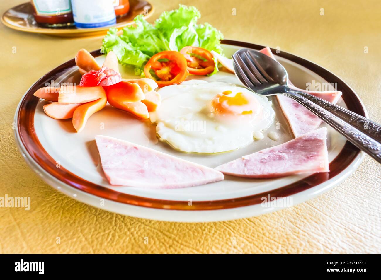 breakfast plate with fried eggs, bacon and sausages Stock Photo - Alamy
