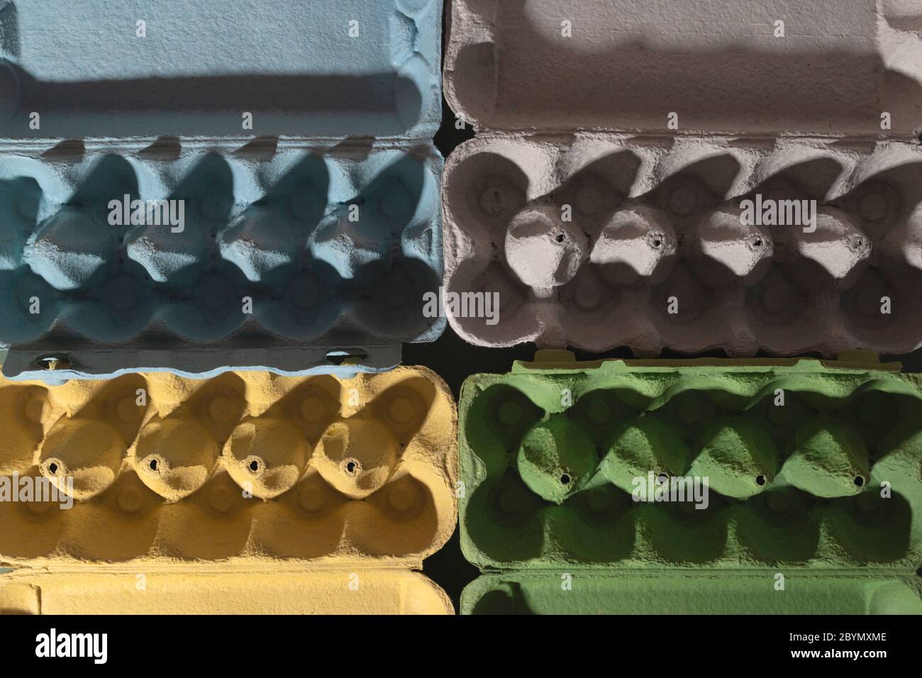 Colored trays from eggs. Garbage collection for recycling concept Stock ...
