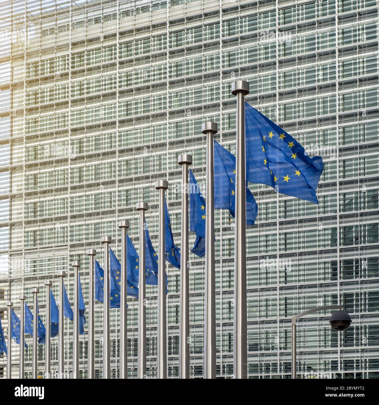 European Union flags in front of the Berlaymont Stock Photo - Alamy