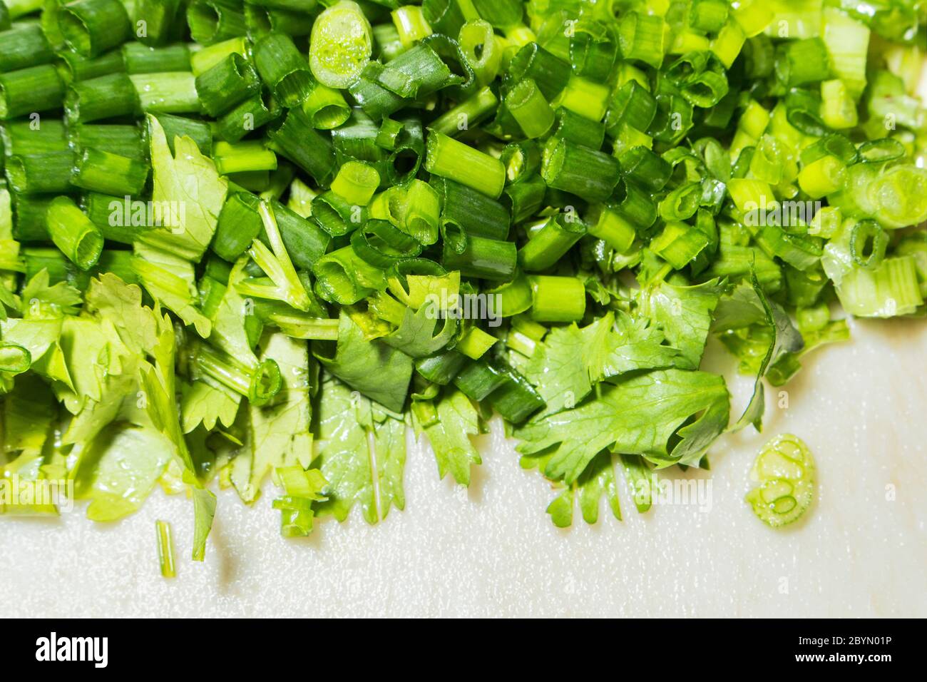 spring onion and coriander sliced for garnish Stock Photo - Alamy