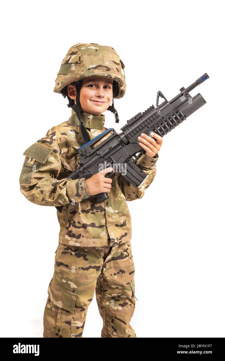Young soldier with rifle Stock Photo - Alamy