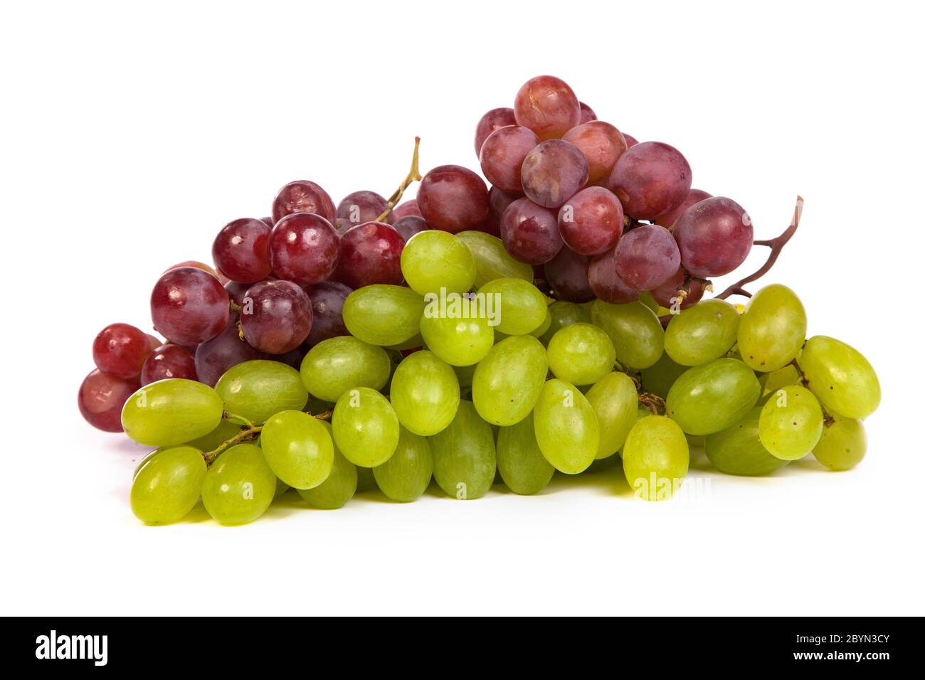Bunch of White and Red Grapes laying isolated Stock Photo - Alamy
