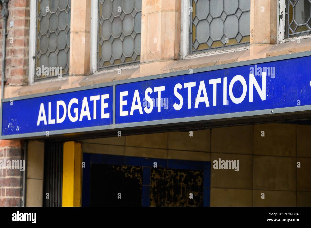 LONDON - SEPTEMBER 23, 2019: Sign above the entrance to Aldgate East ...