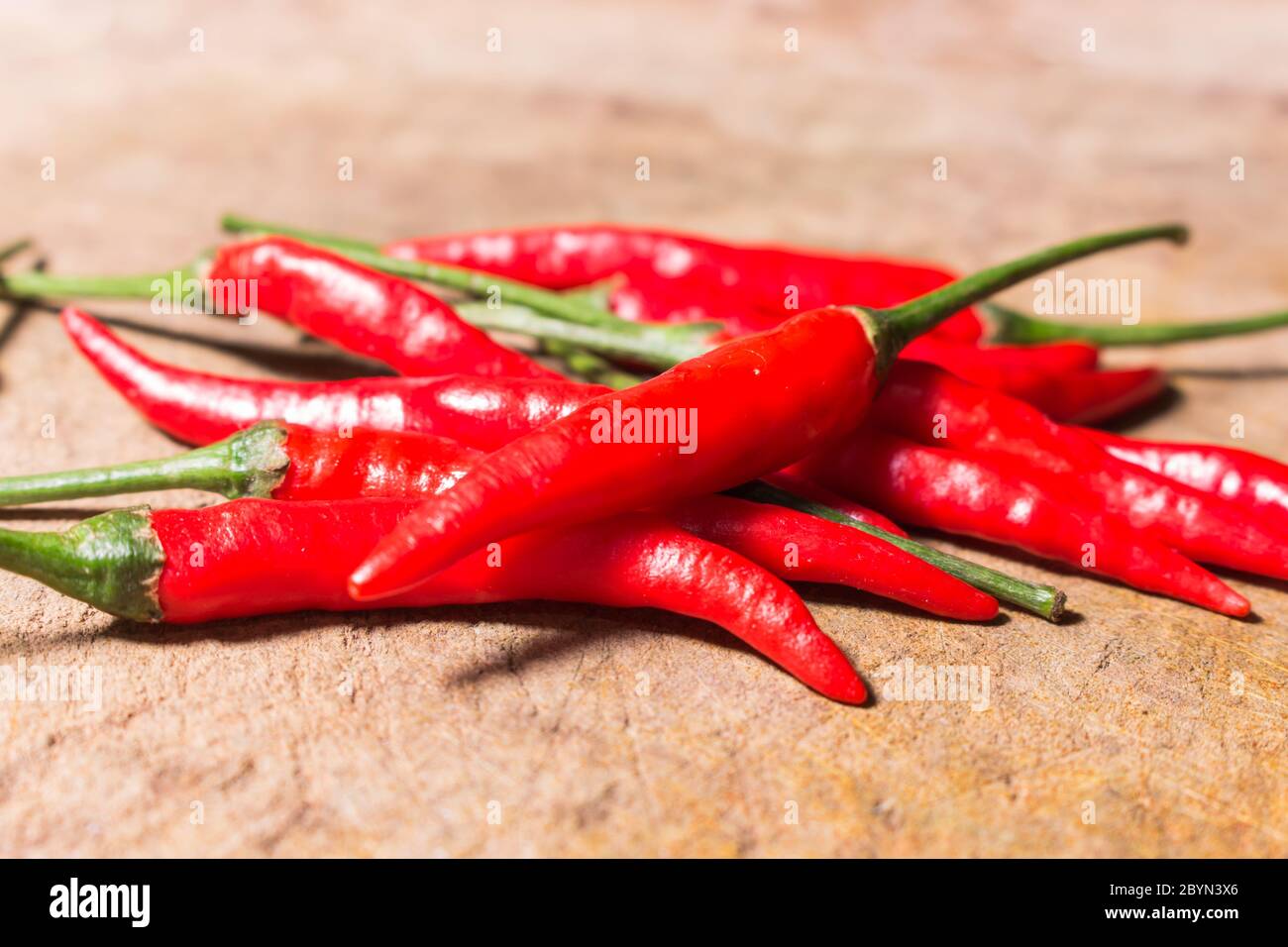 red hot bird chili pepper nature background Stock Photo - Alamy