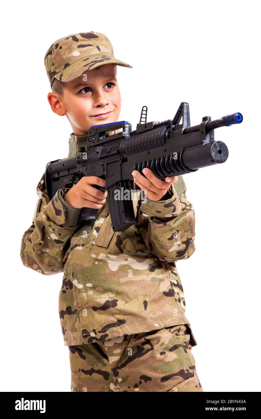 Young soldier with rifle Stock Photo - Alamy