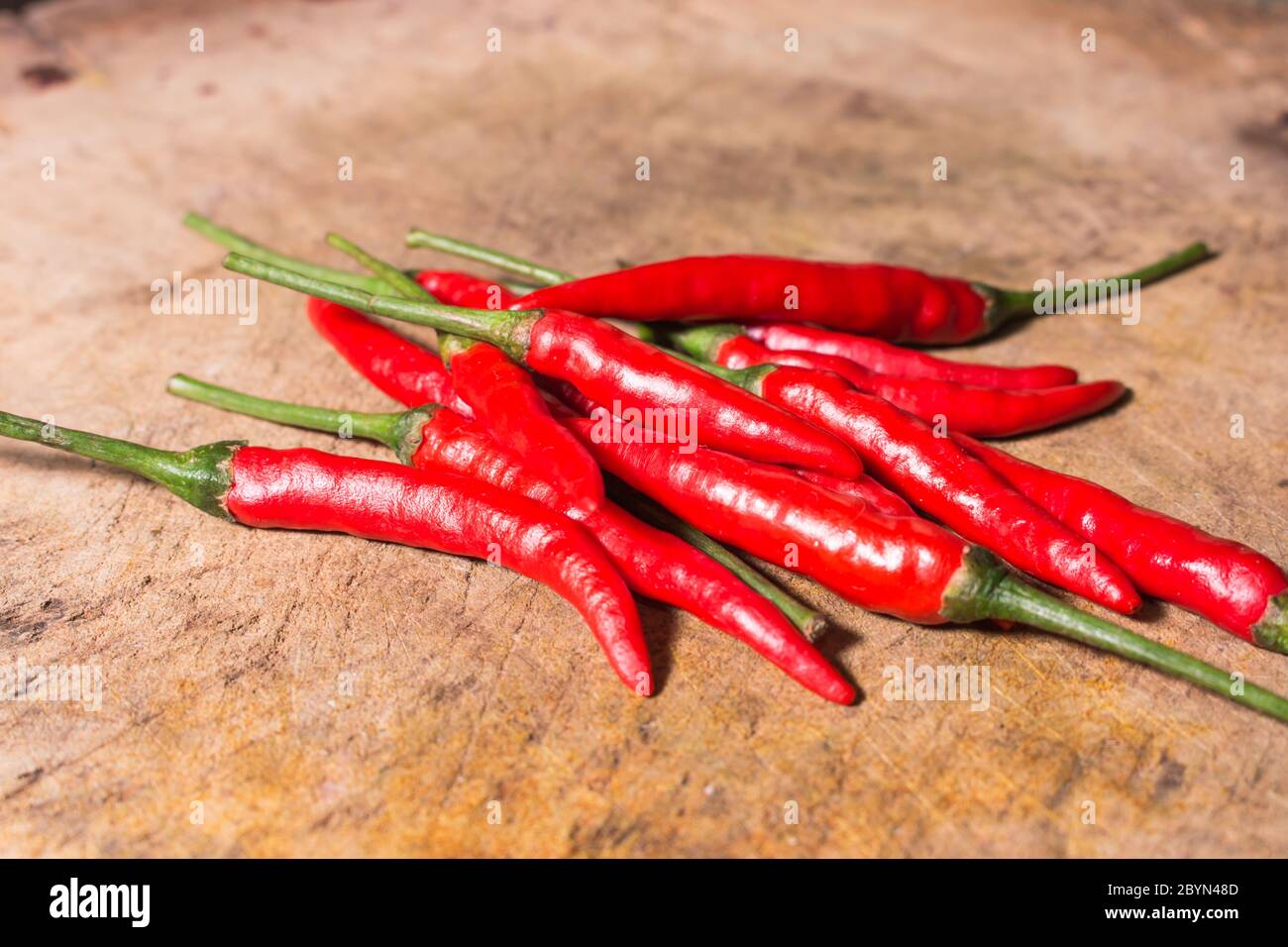 red hot bird chili pepper nature background Stock Photo - Alamy