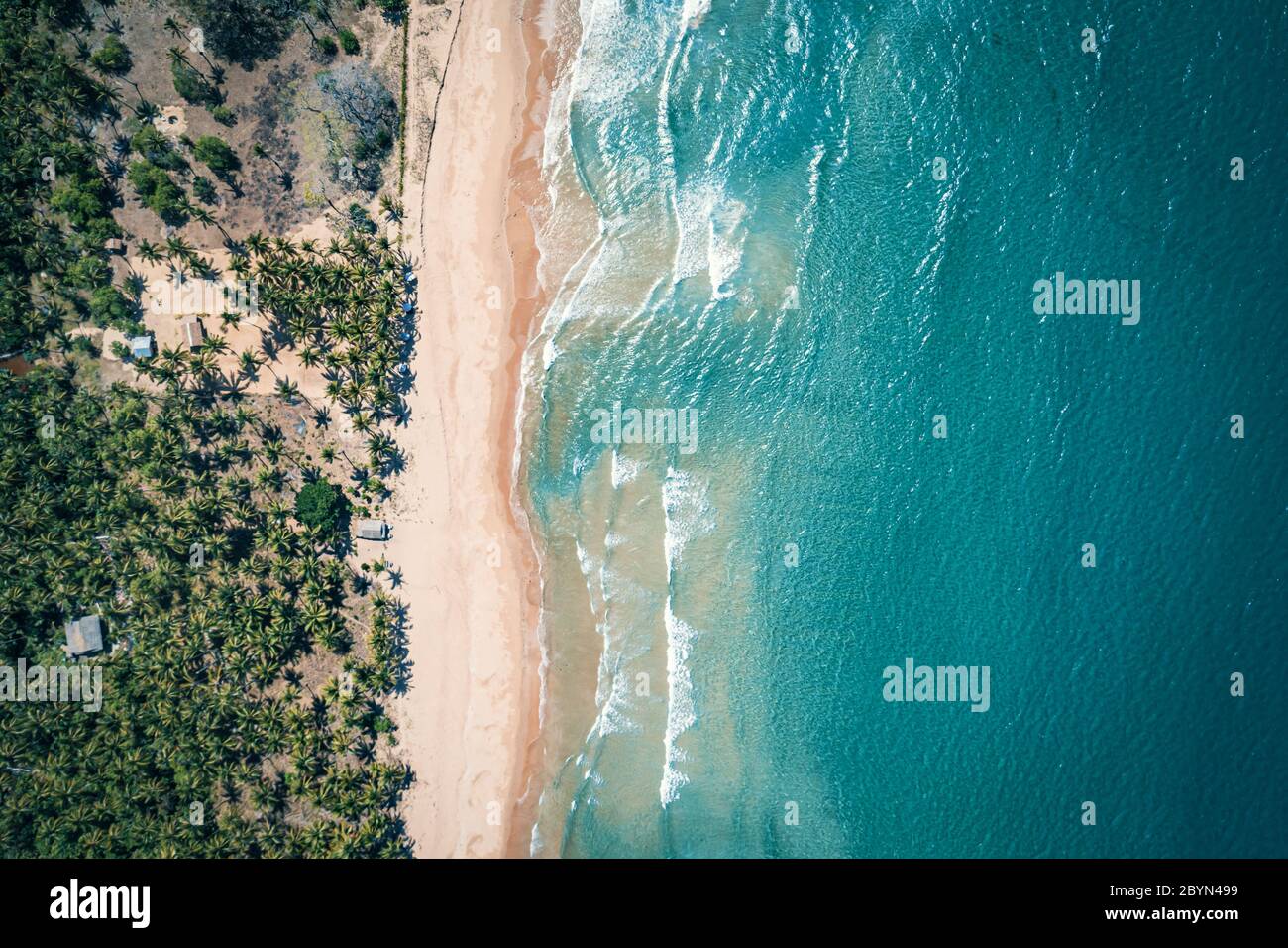 Aerial view to tropical sandy beach and blue ocean. Top view of ocean ...