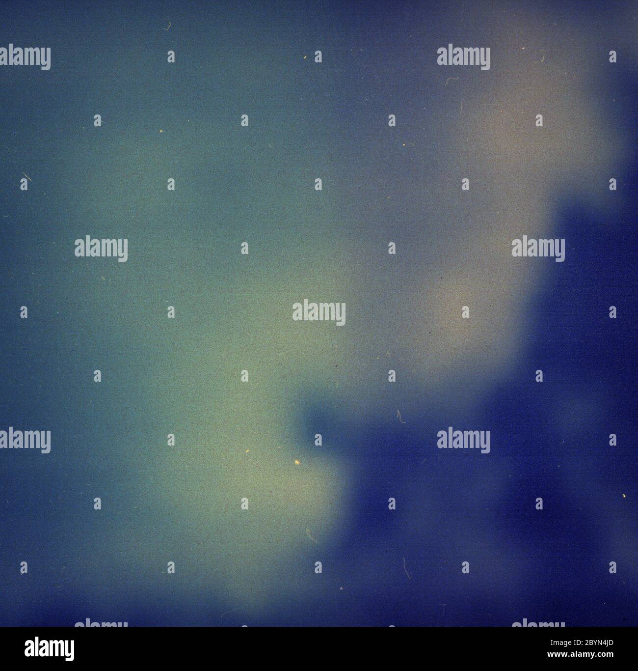 Noisy blue film frame with scratches, dust and grain. Abstract old film ...