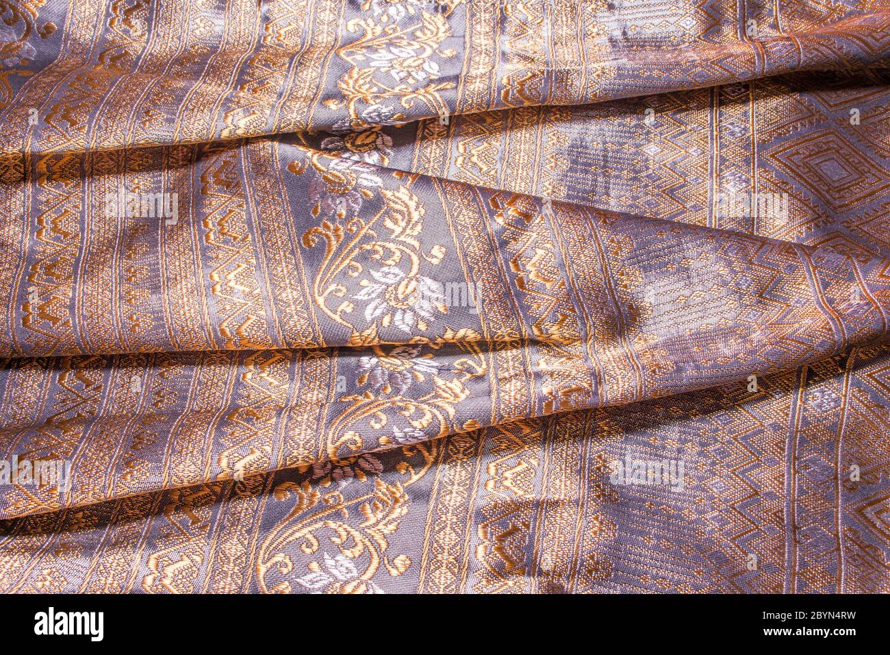 Thai silk traditional texture background Stock Photo - Alamy