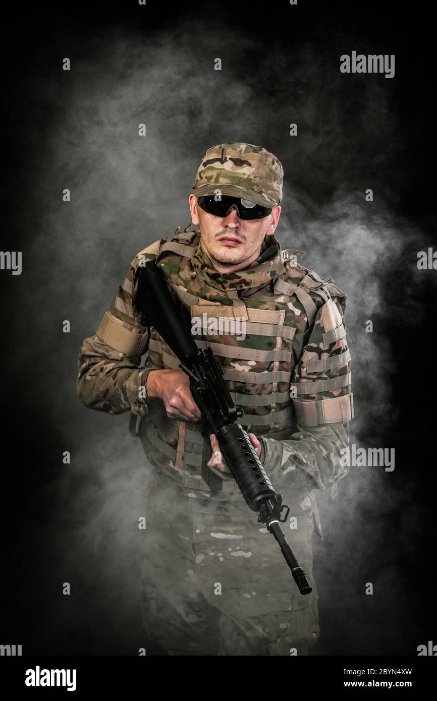 Modern soldier with rifle Stock Photo - Alamy