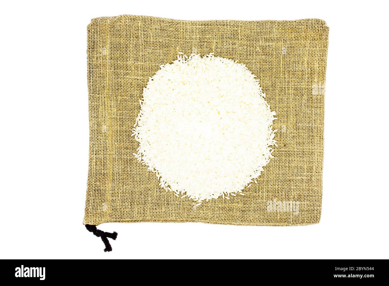 thai raw rice on sack isolated white background Stock Photo - Alamy