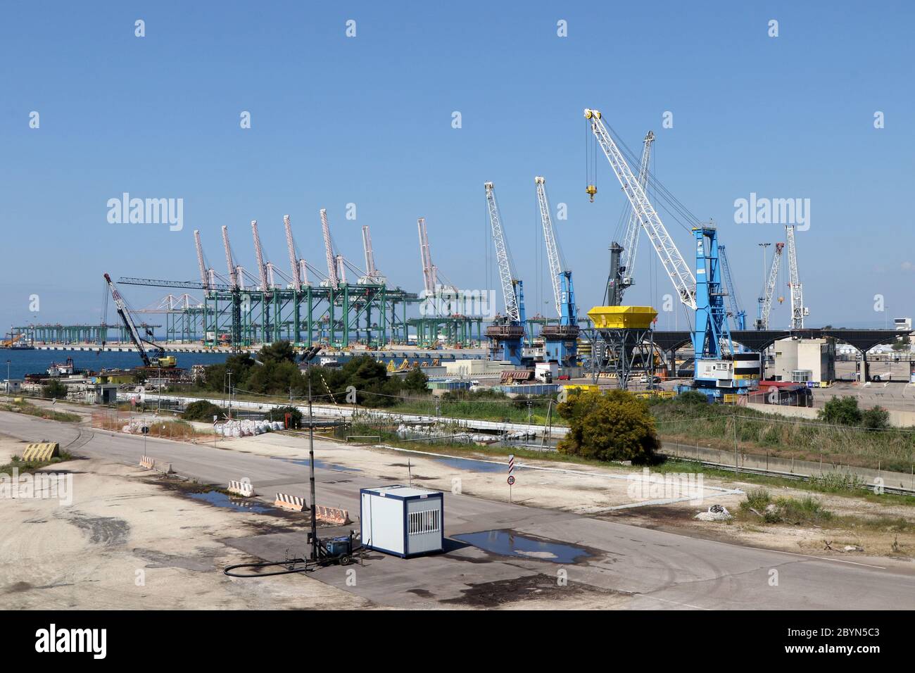 Overview of the cranes of the merchant port of Taranto, Puglia, Italy ...