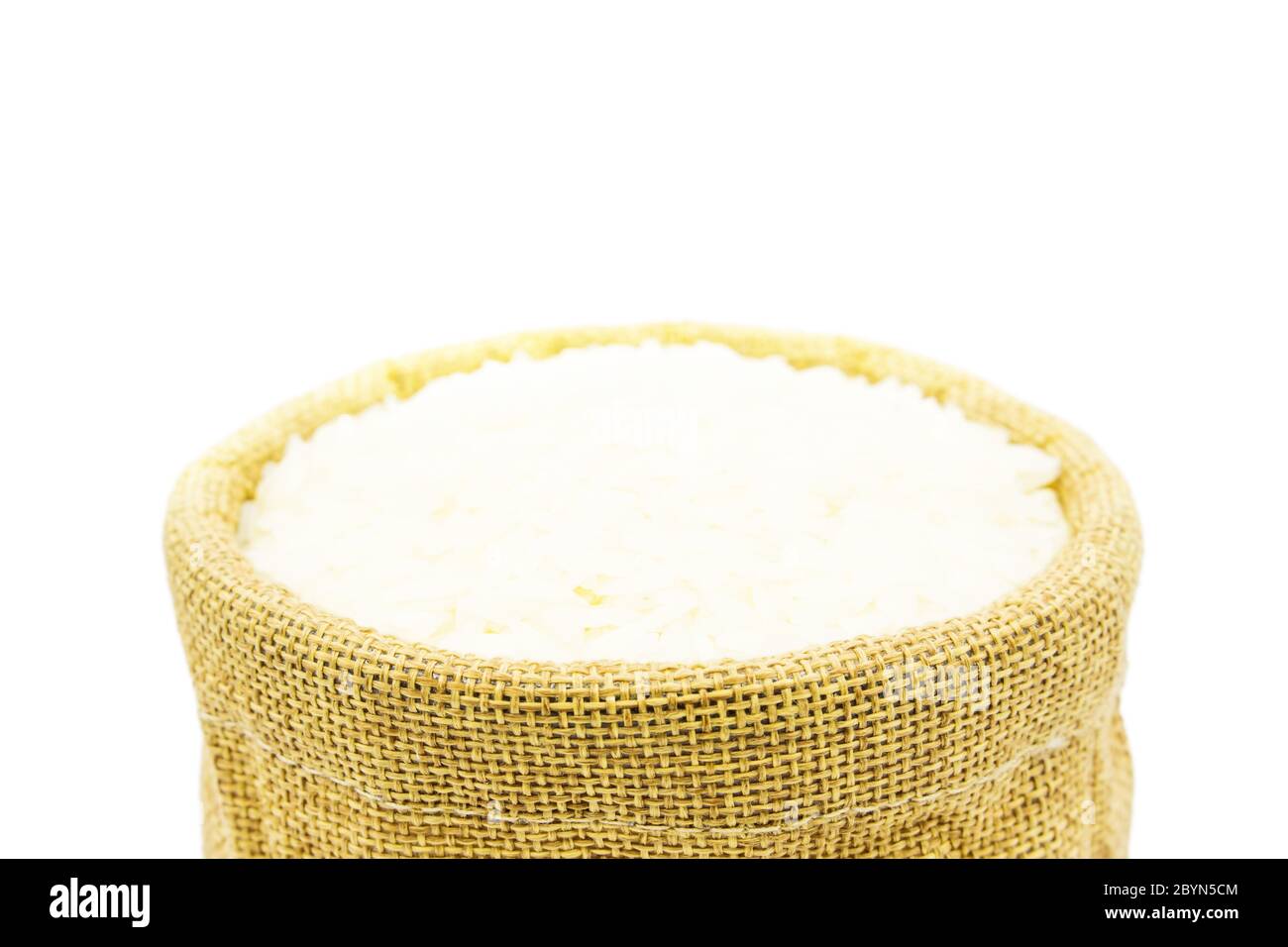 thai raw rice on sack isolated white background Stock Photo - Alamy
