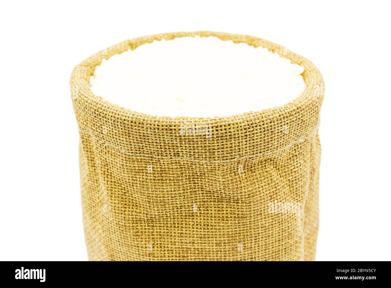 thai raw rice on sack isolated white background Stock Photo - Alamy