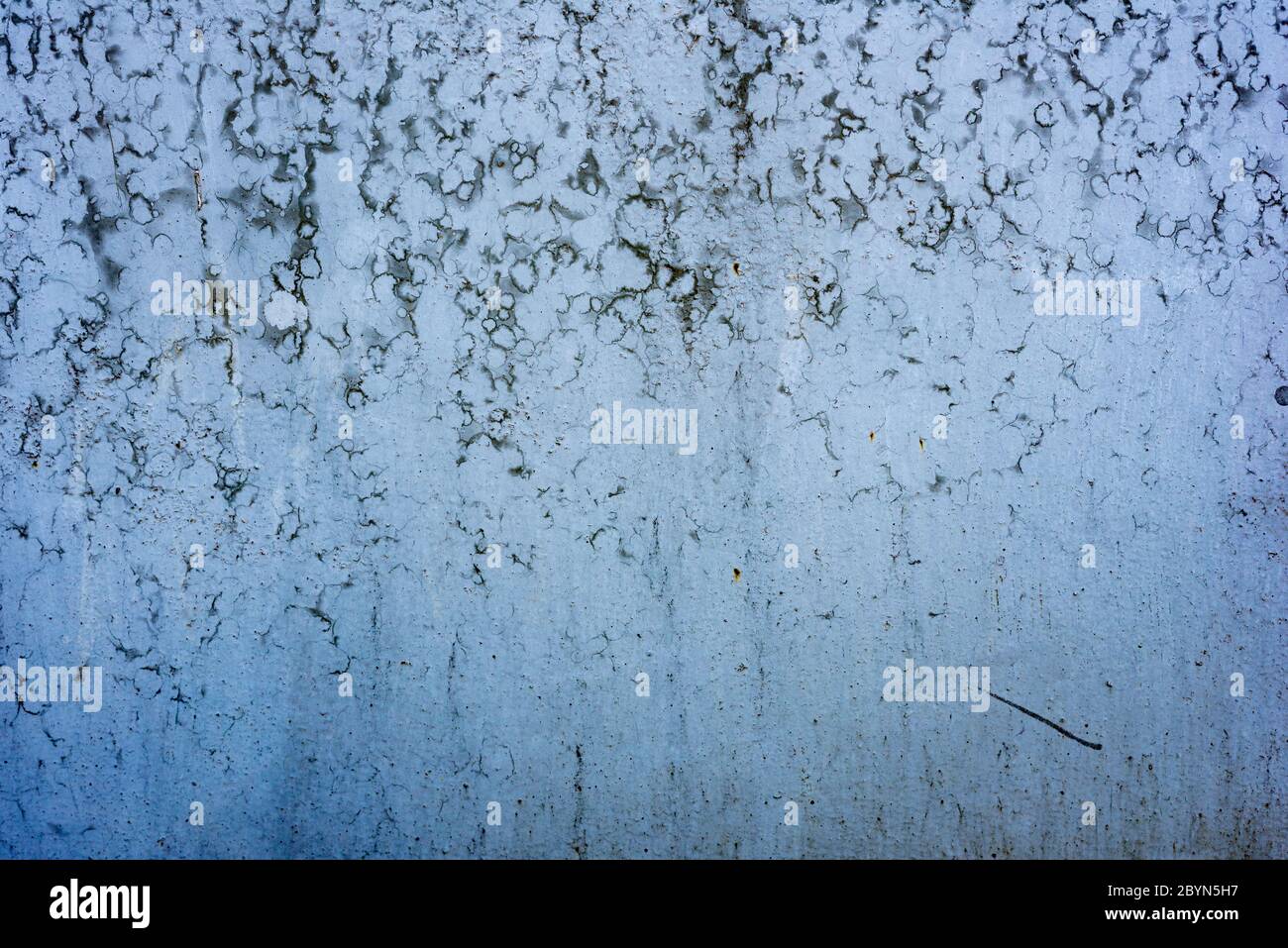 Texture of a metal wall with cracks and scratches which can be used as ...