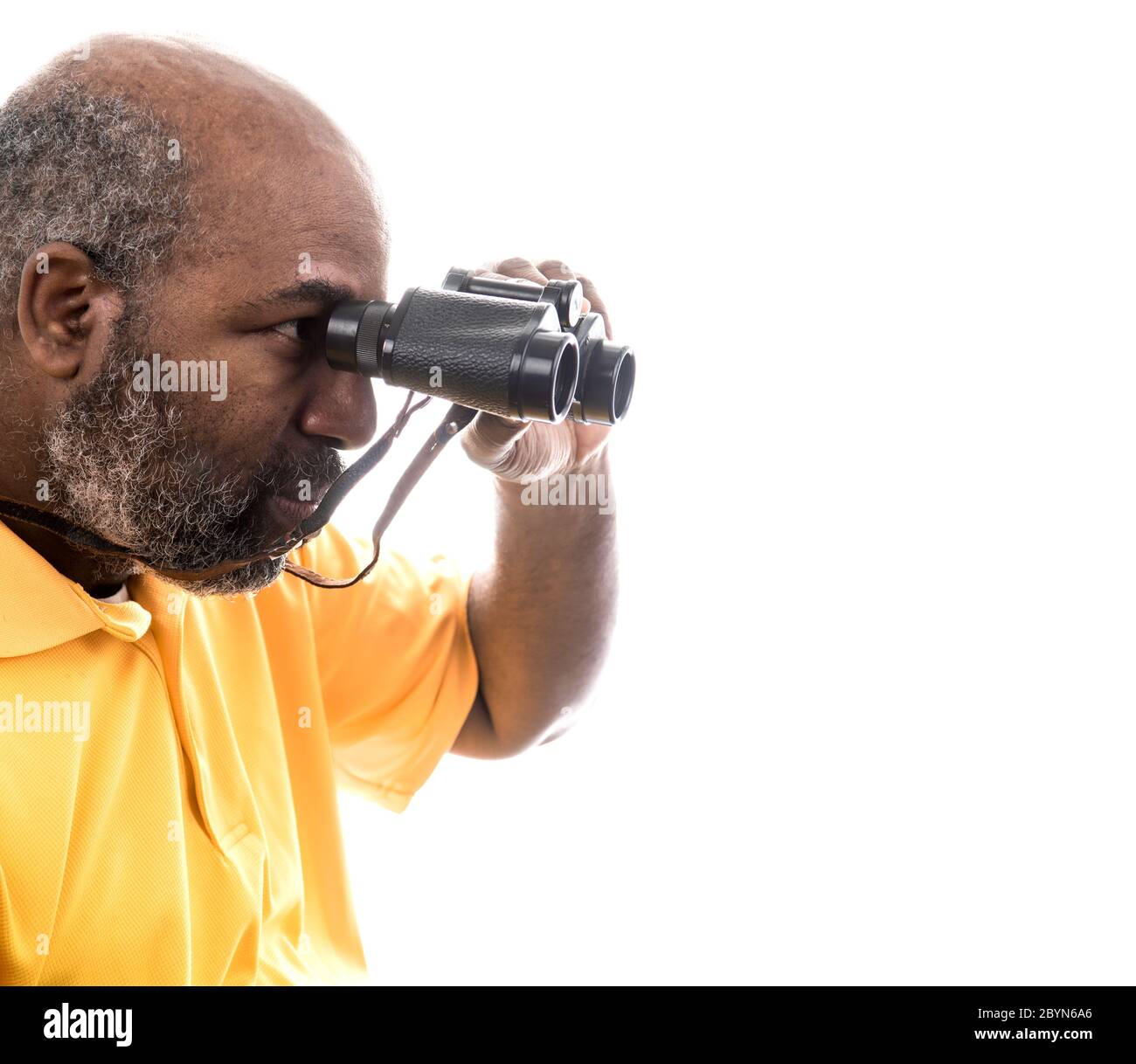 African American man looking through binoculars on white background ...