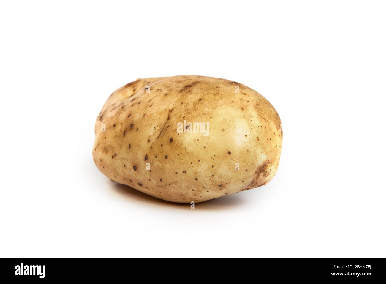 One potato isolated on white Stock Photo - Alamy