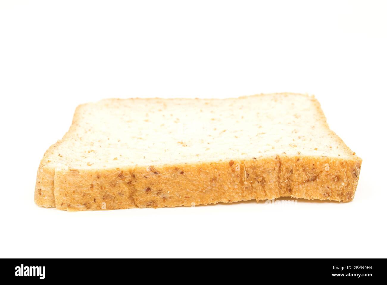 whole wheat bread isolated white background Stock Photo - Alamy