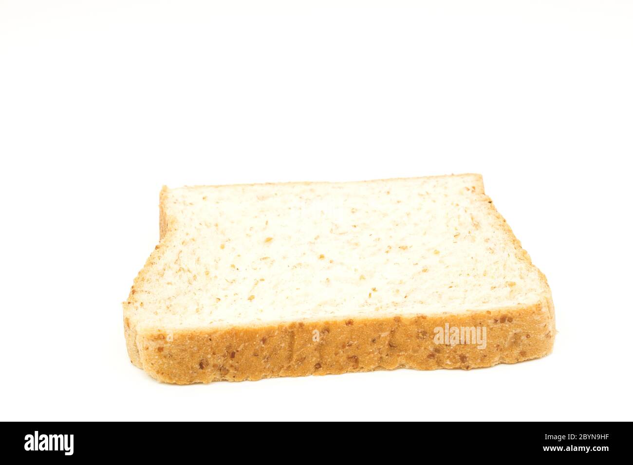 whole wheat bread isolated white background Stock Photo - Alamy