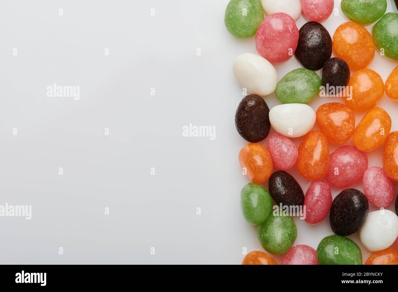 Colorful jelly on white background with copy space Stock Photo - Alamy