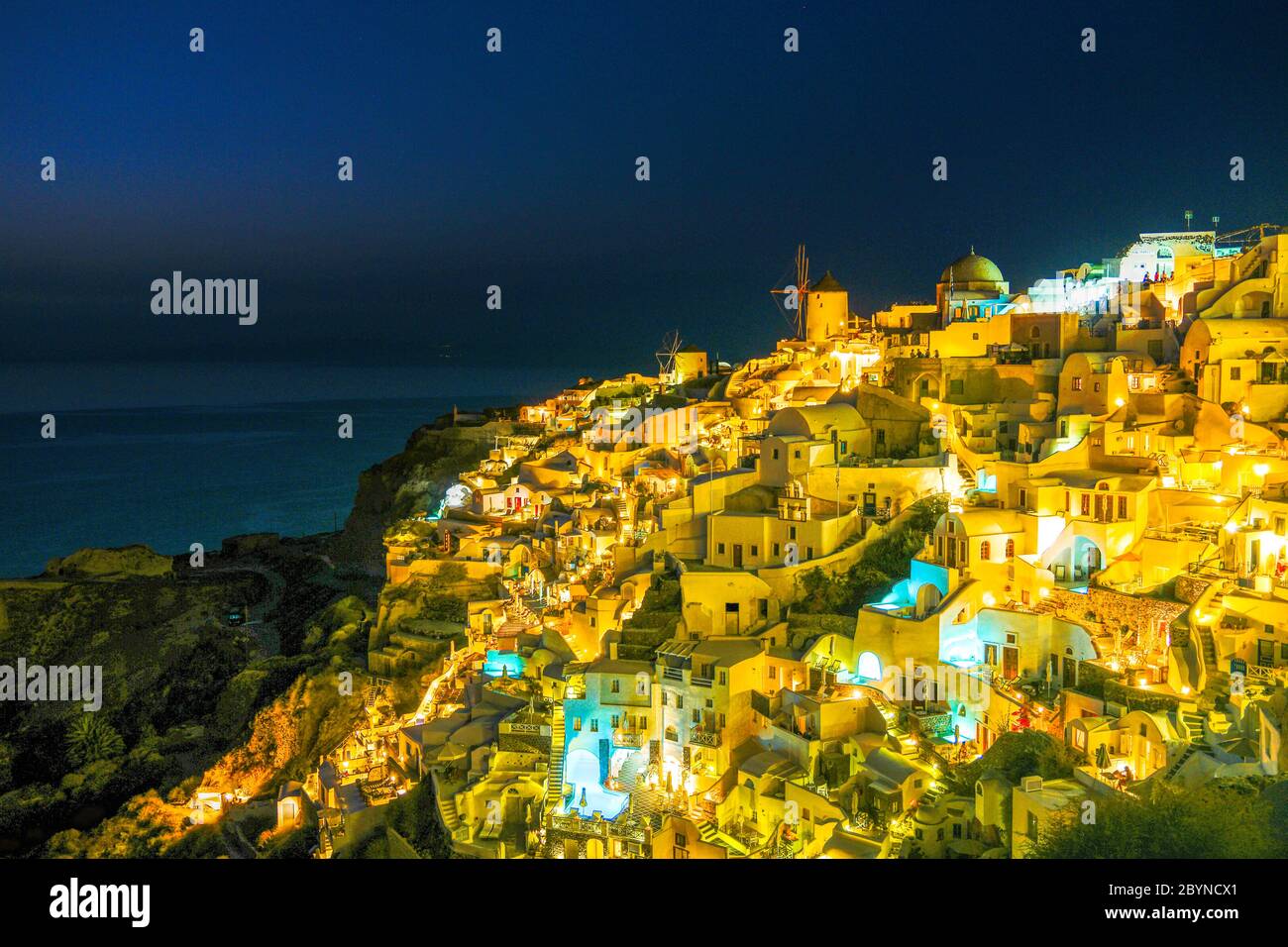 Santorini Oia Greece Europe, sunset at the white village of Oia ...