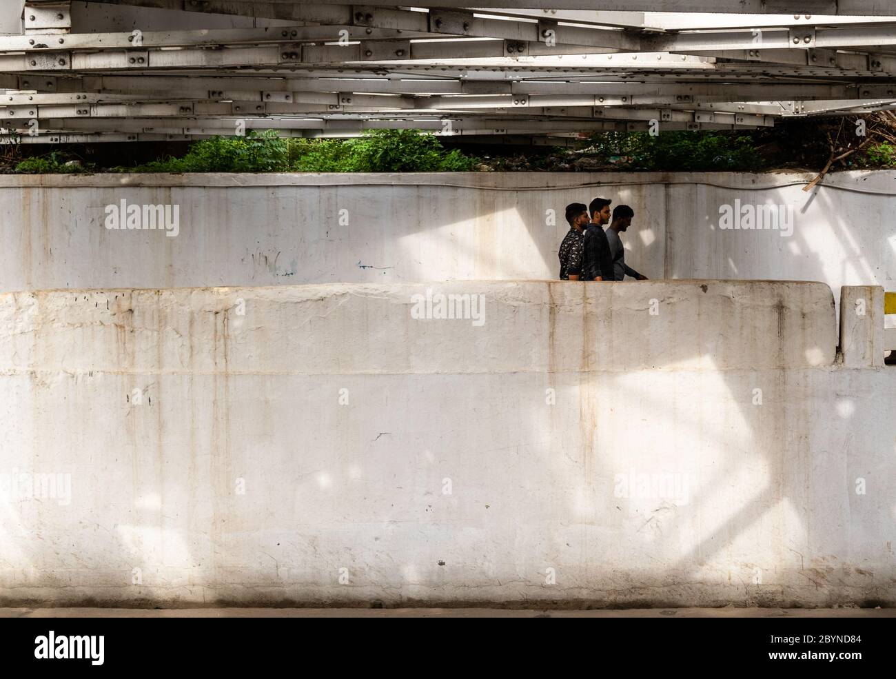 Chennai, Tamil Nadu, India - August 2018: Three Indian pedestrians ...