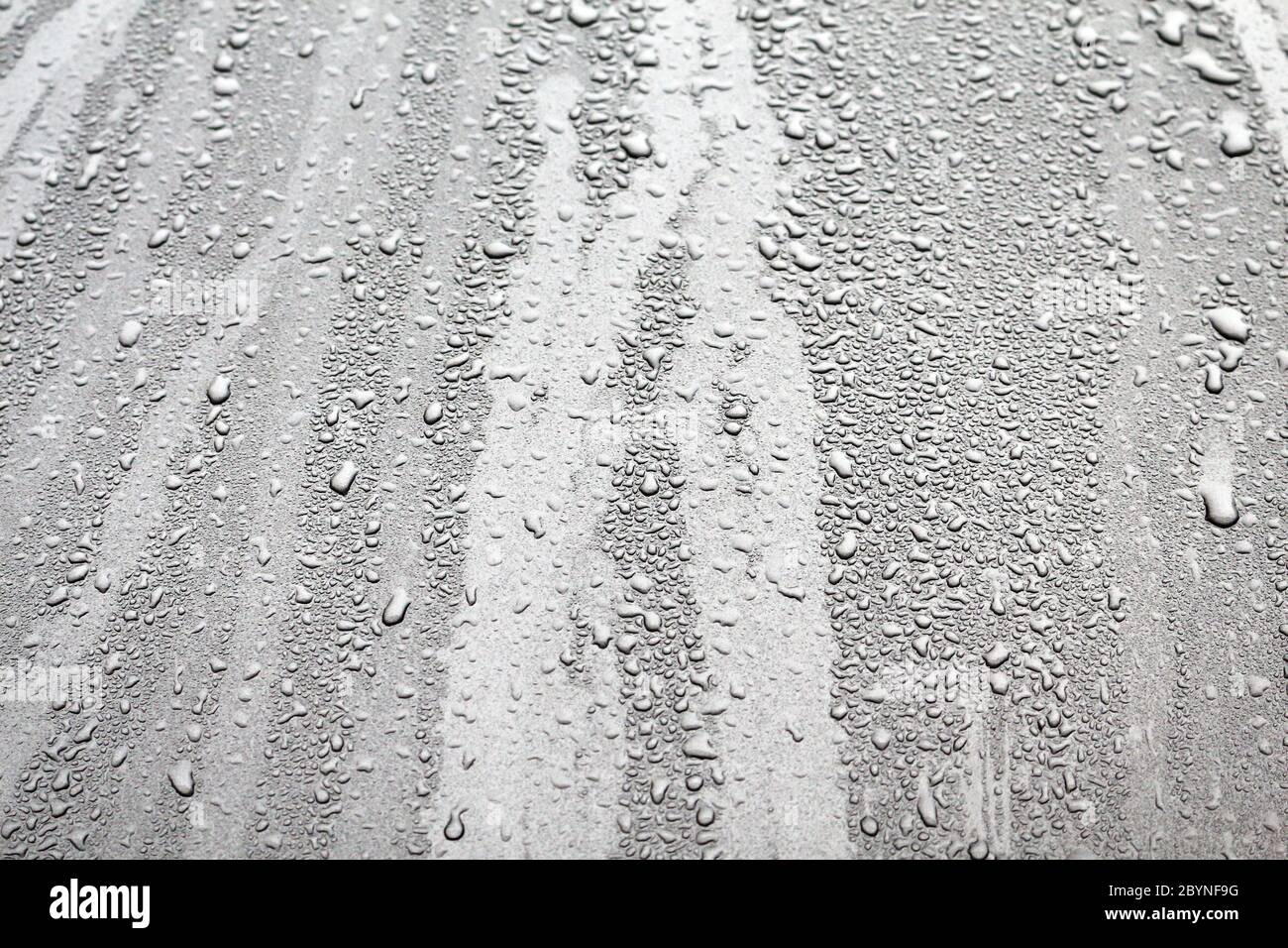water drop of rain on car bonnet Stock Photo - Alamy