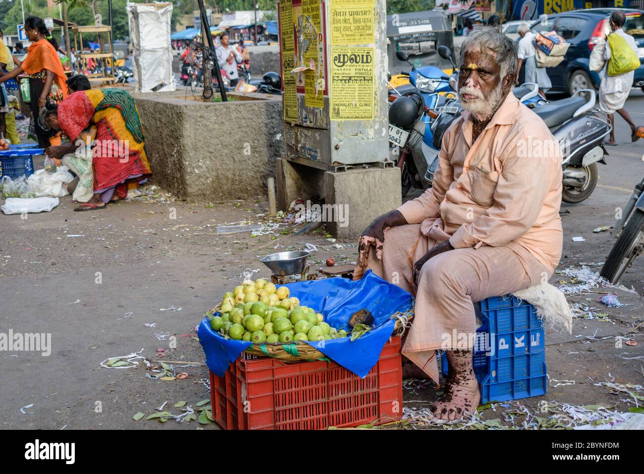 Chennai, Tamil Nadu, India - August 2018: An elderly Indian man selling ...