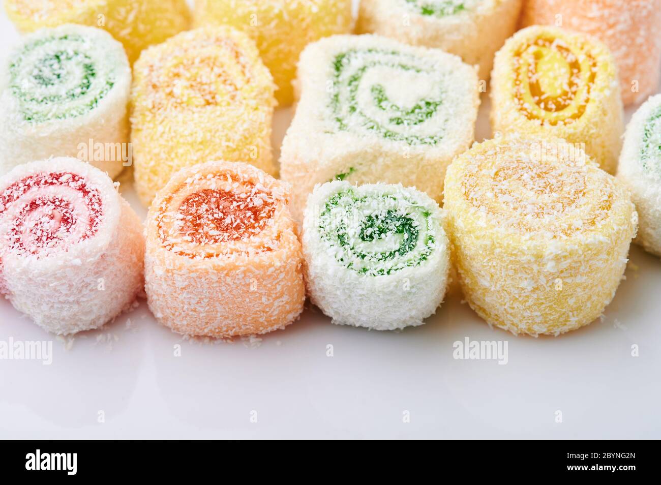 Sugar colorful rolls rows with copy white space Stock Photo - Alamy