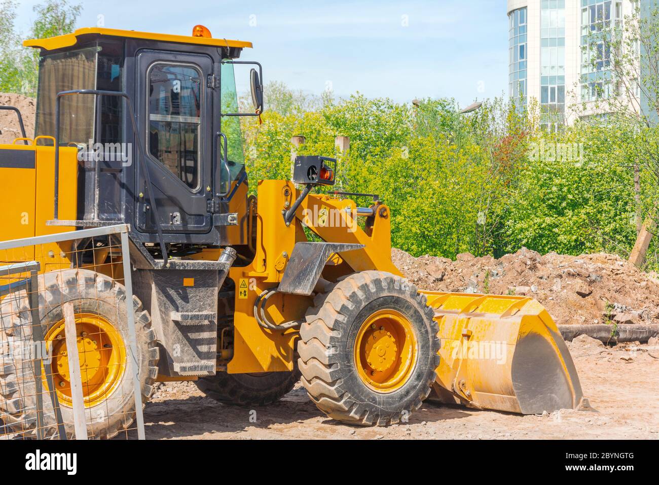 Yellow bulldozer with bucket, heavy Equipment Machine Stock Photo - Alamy