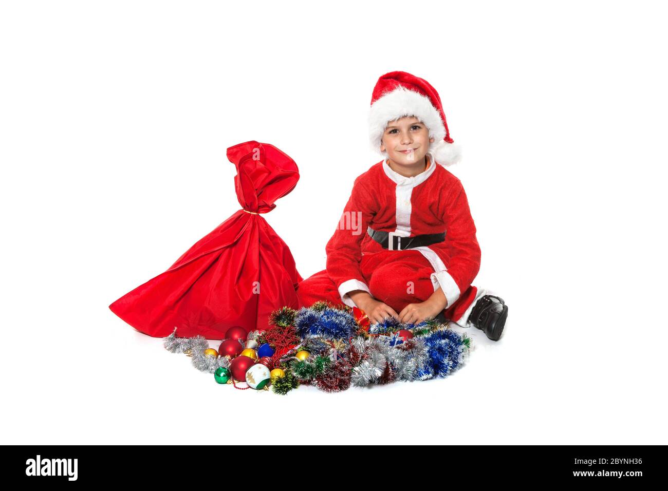 Boy holding a sack Stock Photo - Alamy