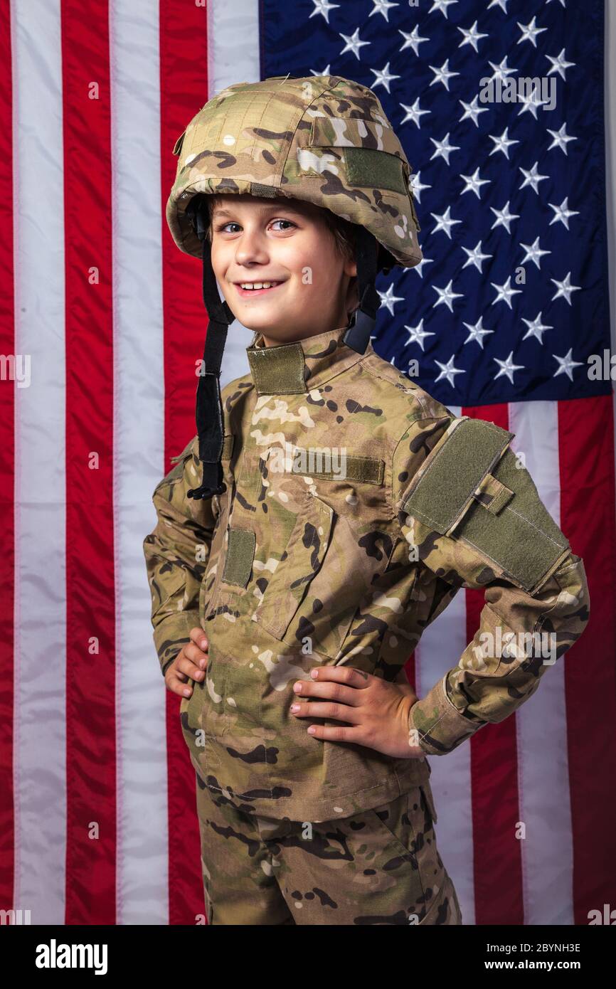 Child dressed as soldier saluting hi-res stock photography and images ...