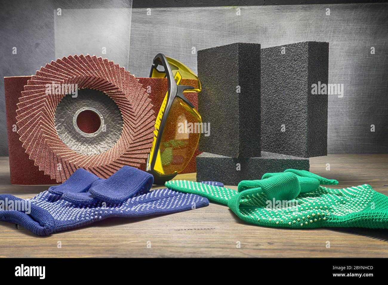 Different tools for sanding - sanding belt, abrasive sponge and flap ...