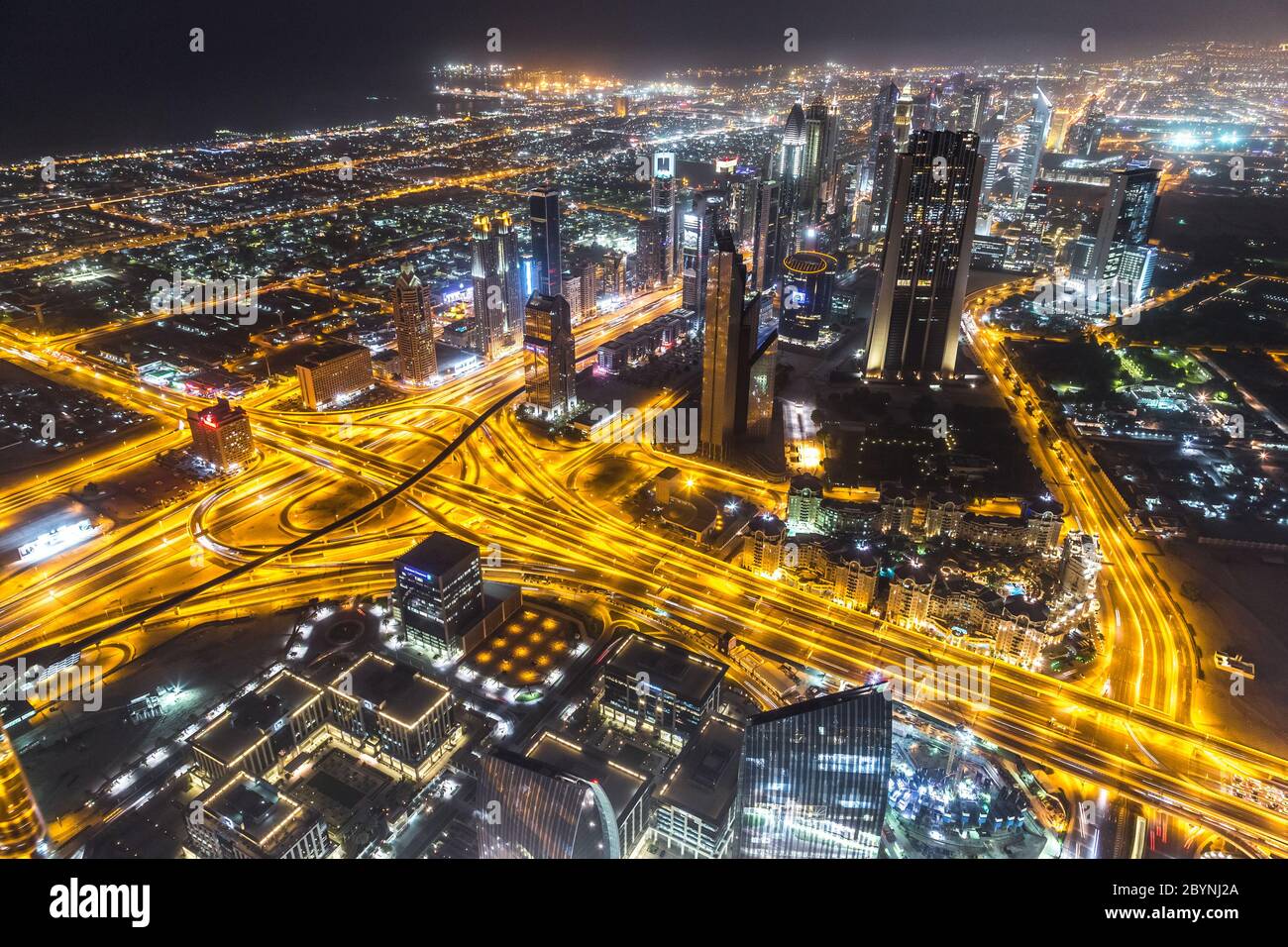 Dubai downtown night scene with city lights Stock Photo - Alamy